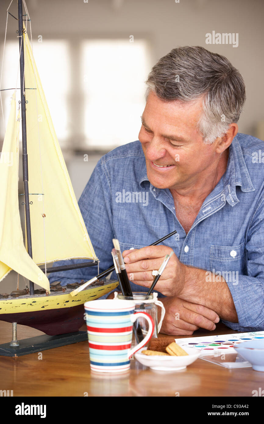 Senior man model making Stock Photo - Alamy