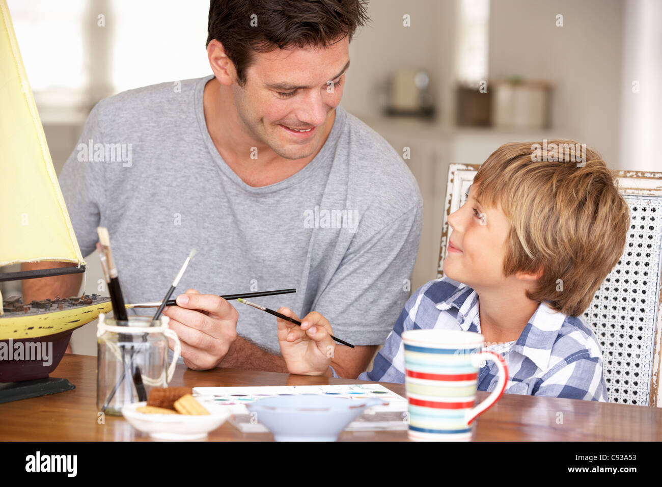 Father model making with son Stock Photo - Alamy