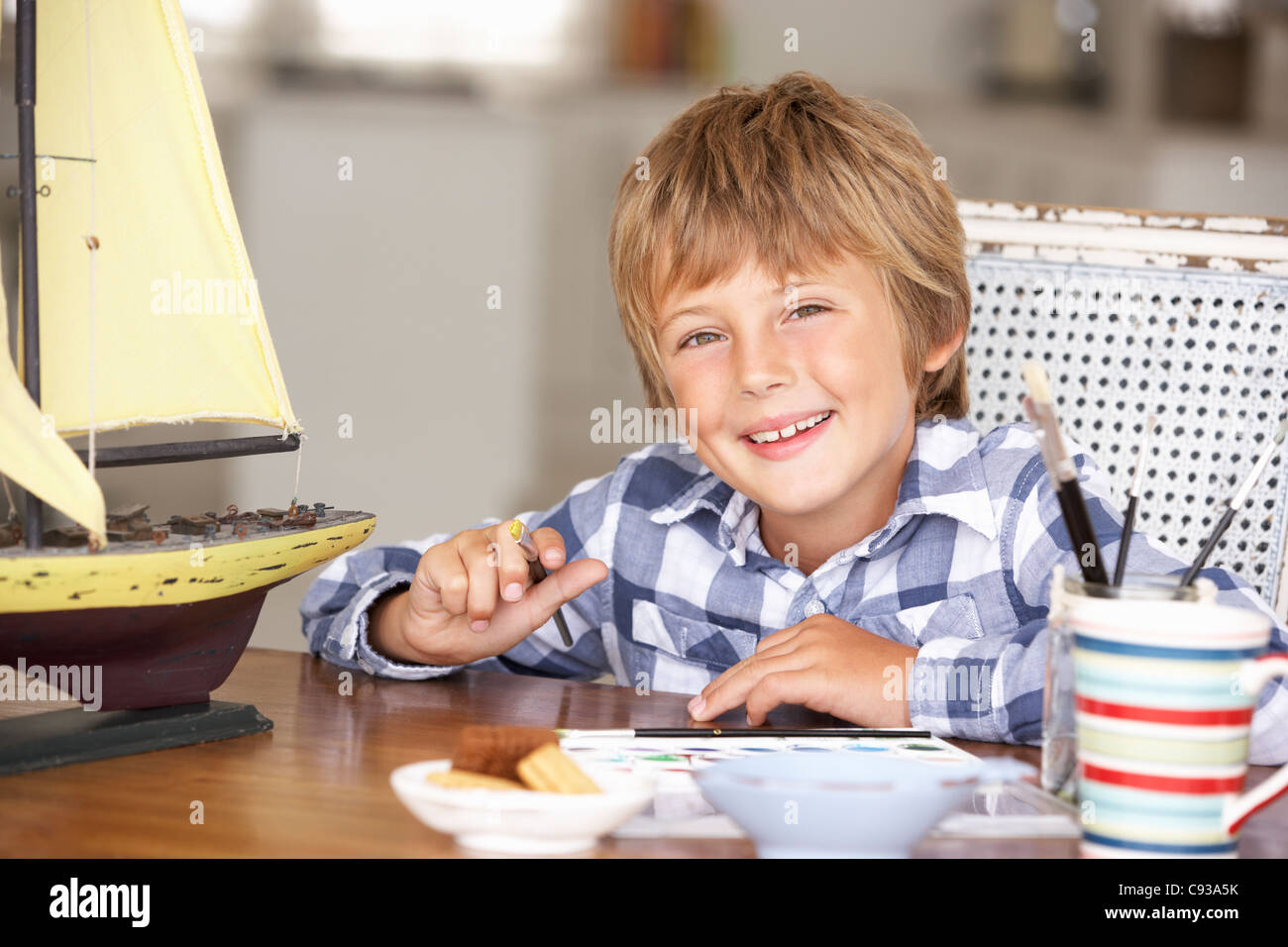 Make model ship child painting hi-res stock photography and images - Alamy