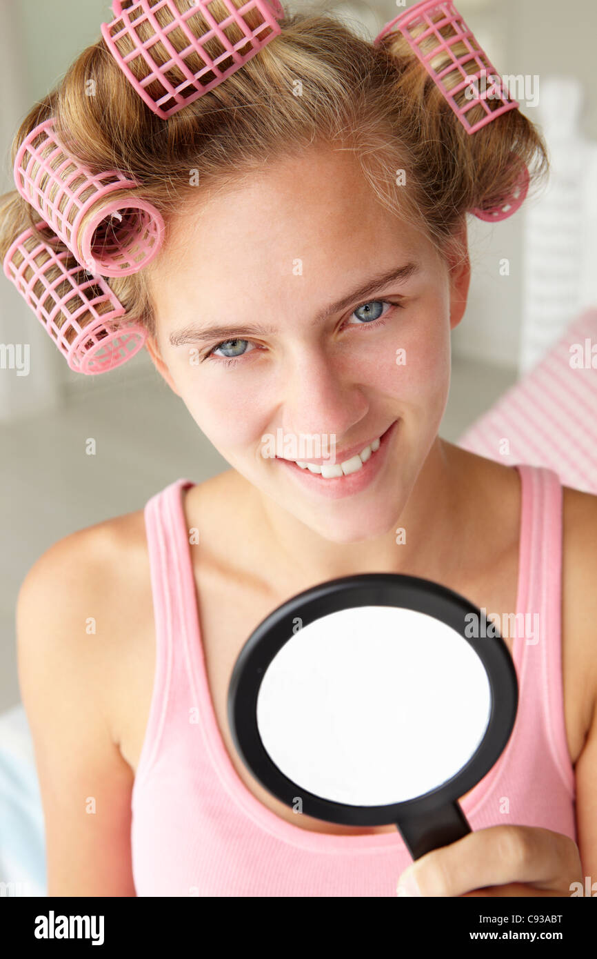 Blond girl hair curlers rollers hi-res stock photography and images - Alamy
