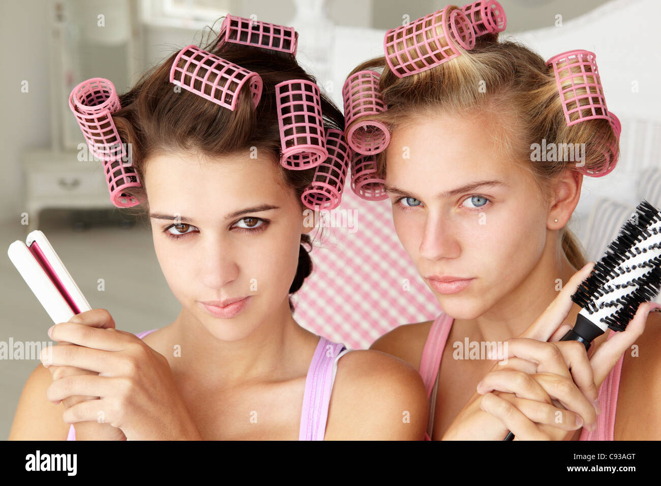 Teenage girls with hair in curlers Stock Photo - Alamy
