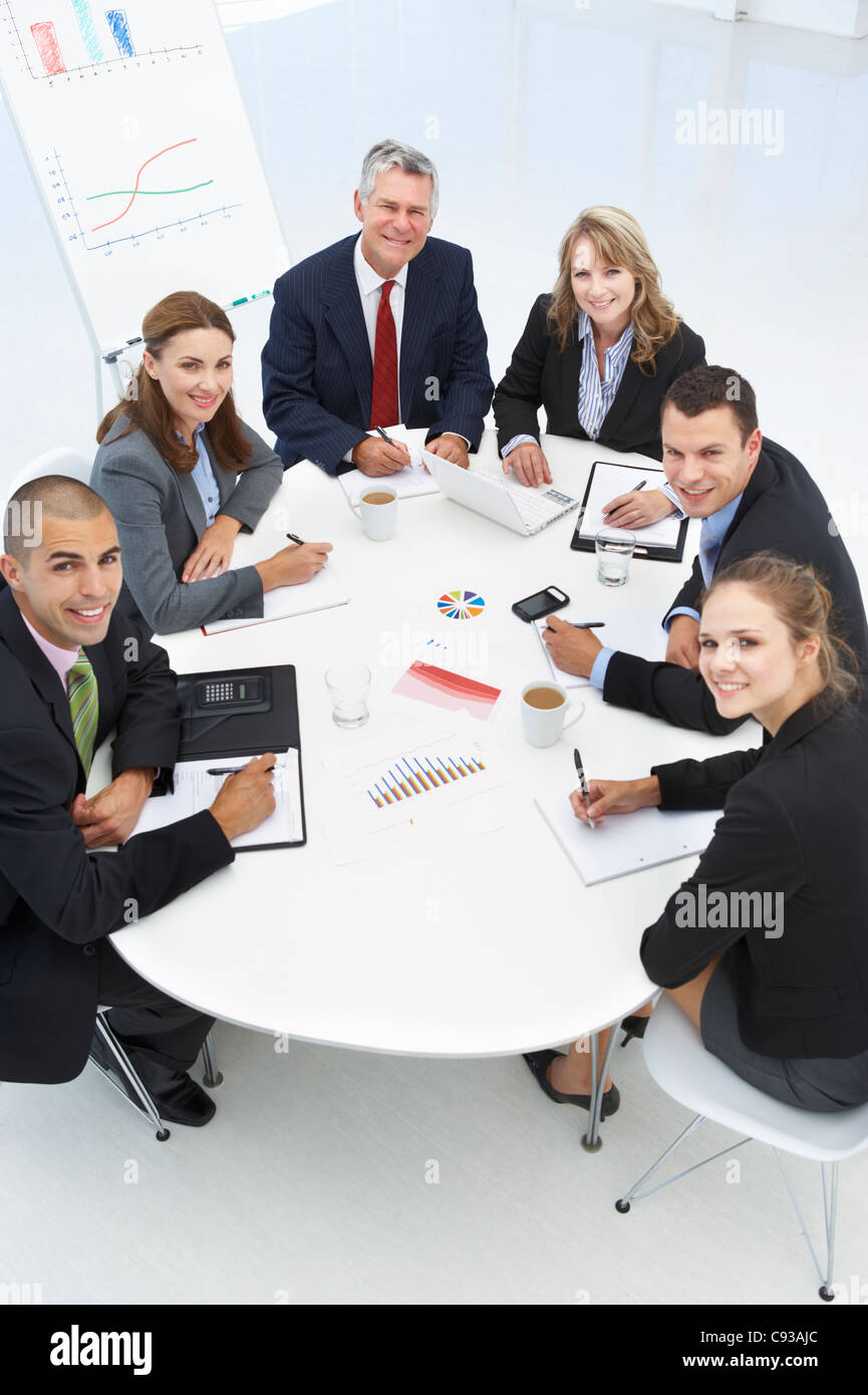 Mixed group in business meeting Stock Photo - Alamy