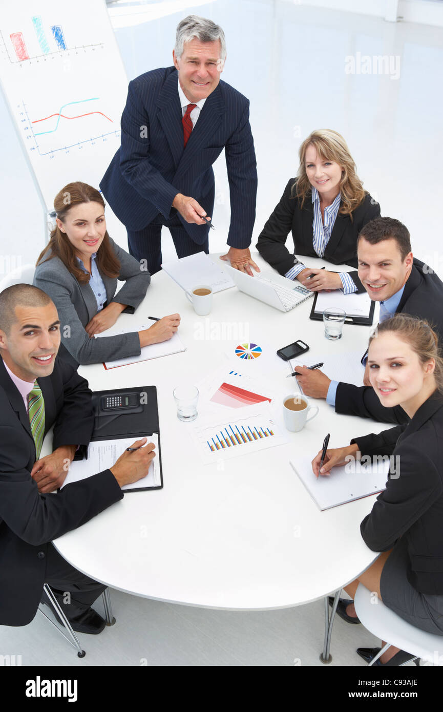 Mixed group in business meeting Stock Photo - Alamy