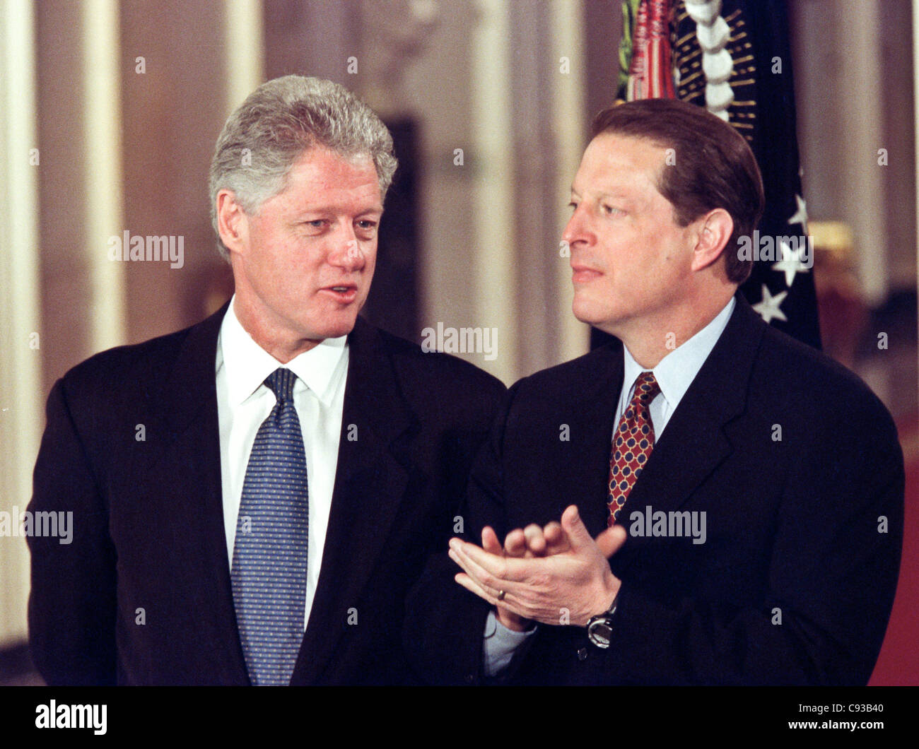 U.S President Bill Clinton talks with Vice President Al Gore (R) before ...