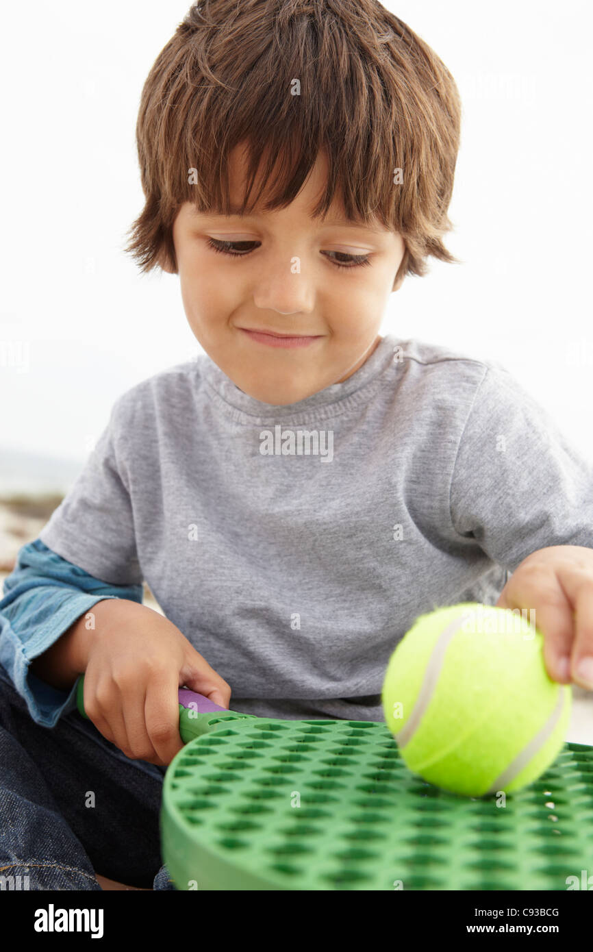 Young boy with bat and ball Stock Photo - Alamy