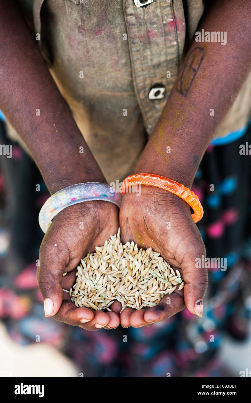Poor children holding hands hi-res stock photography and images - Alamy