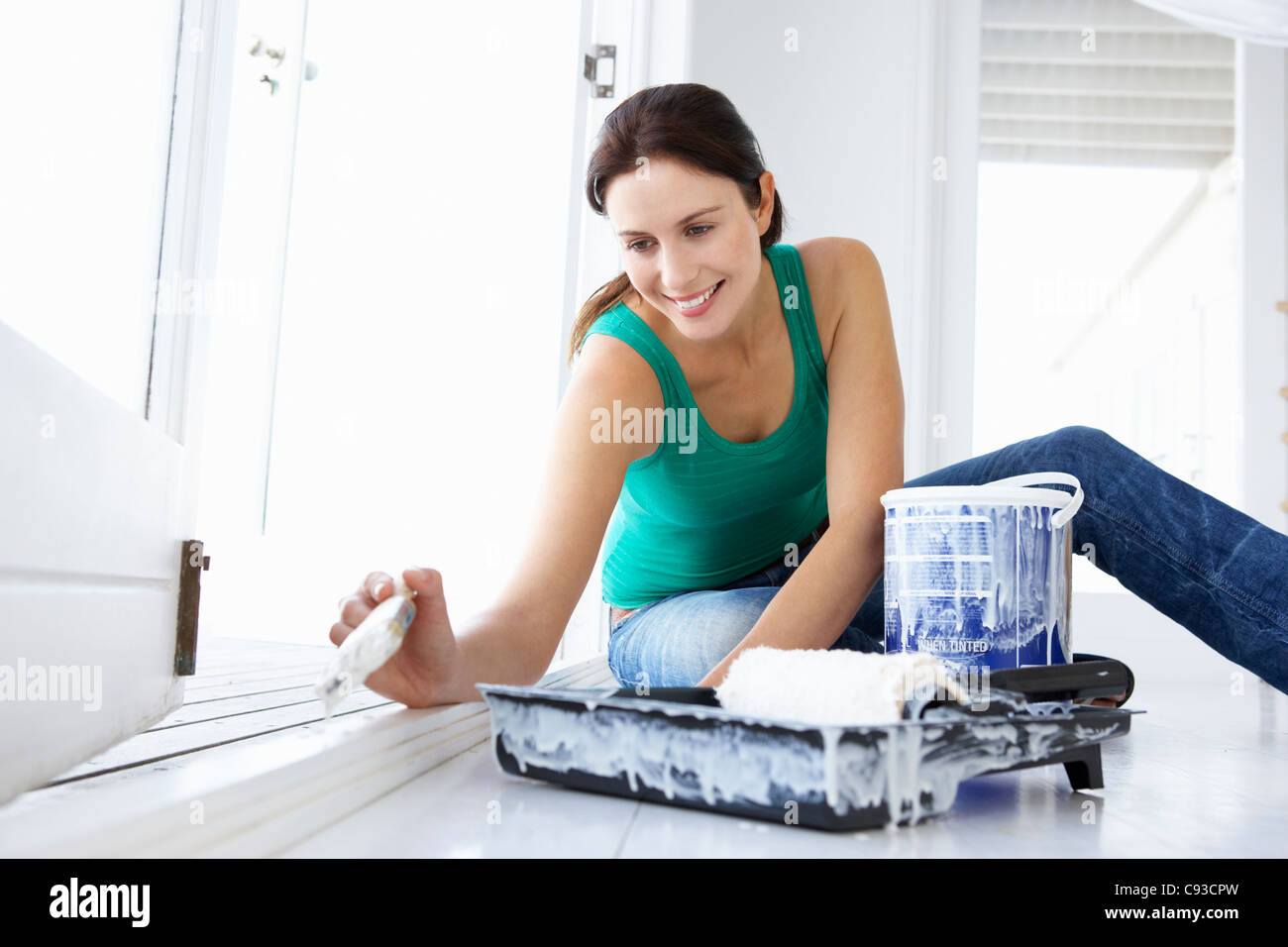 Woman decorating house Stock Photo - Alamy