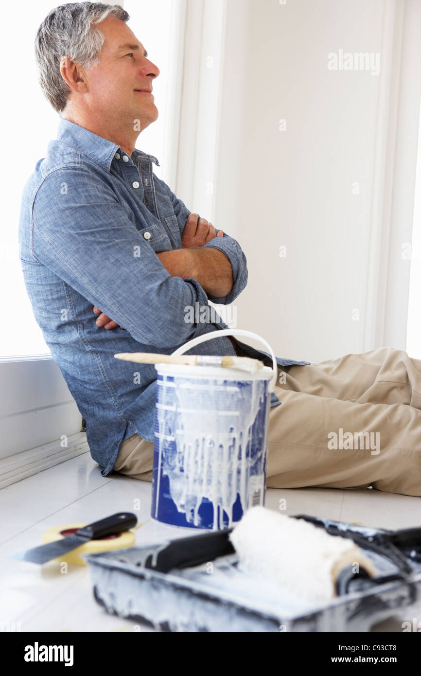 Man painting house retirement hi-res stock photography and images - Alamy