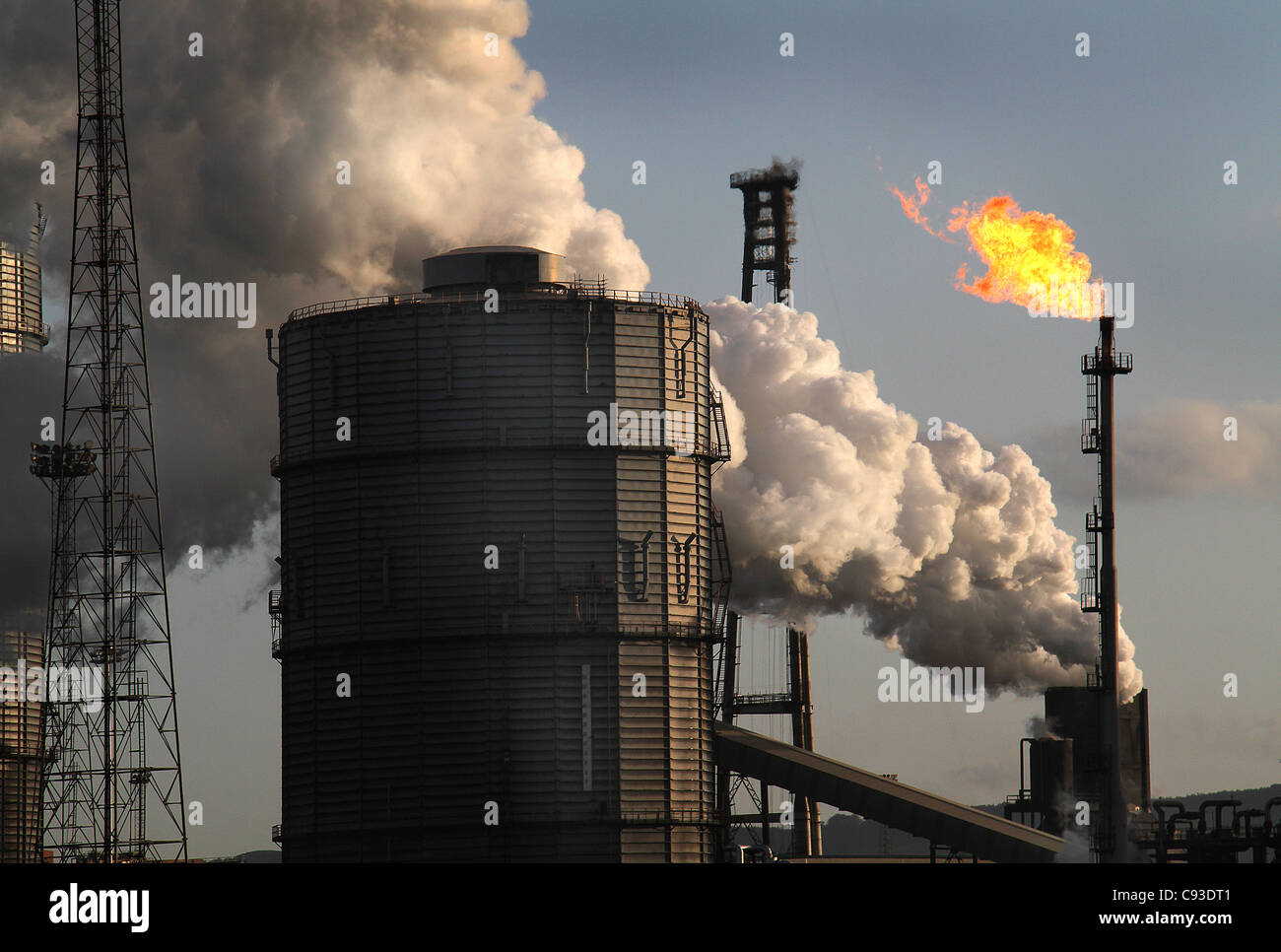 Gas flare lit on coke making plant Stock Photo - Alamy