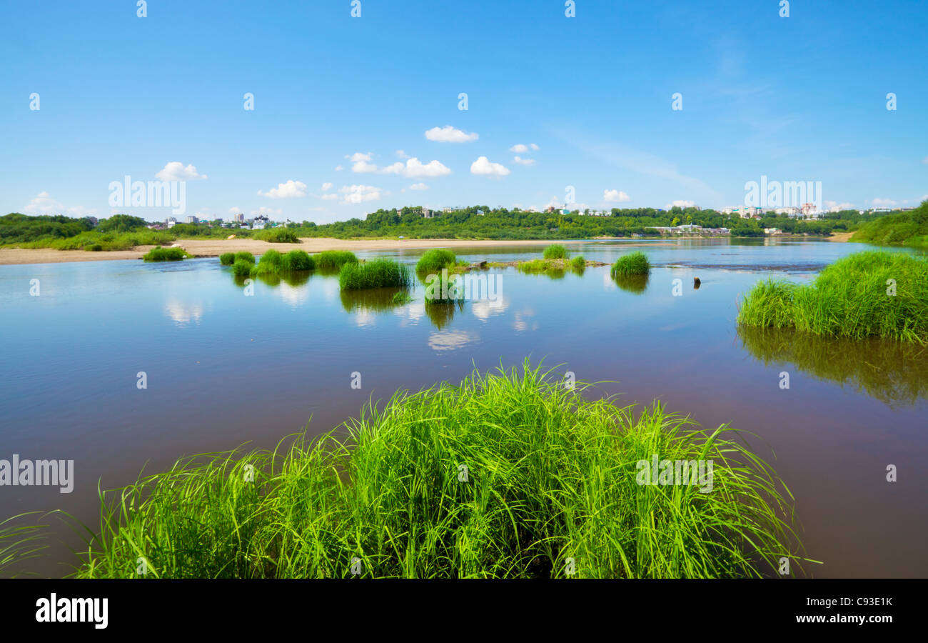 calm river under blue sky at summer day Stock Photo - Alamy