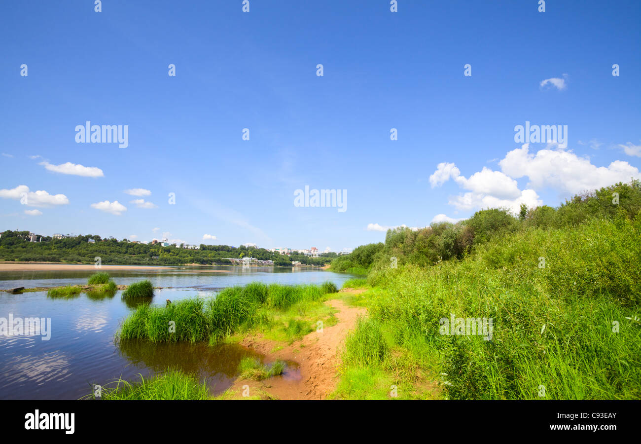 calm river under blue sky at summer day Stock Photo - Alamy