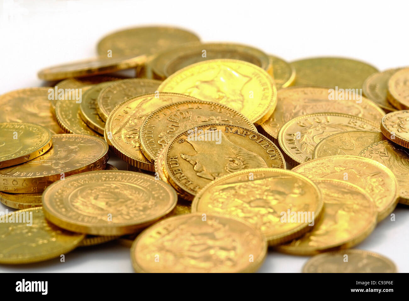 gold coins on the white background Stock Photo - Alamy