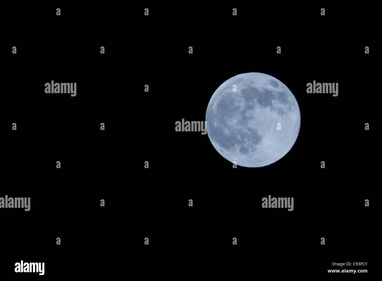 A mesmerizing full moon illuminates the night sky, casting its ethereal ...