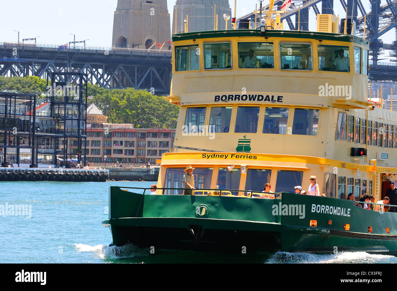 Sydney Ferry coming into Circular Quay terminal with Sydney Harbour ...
