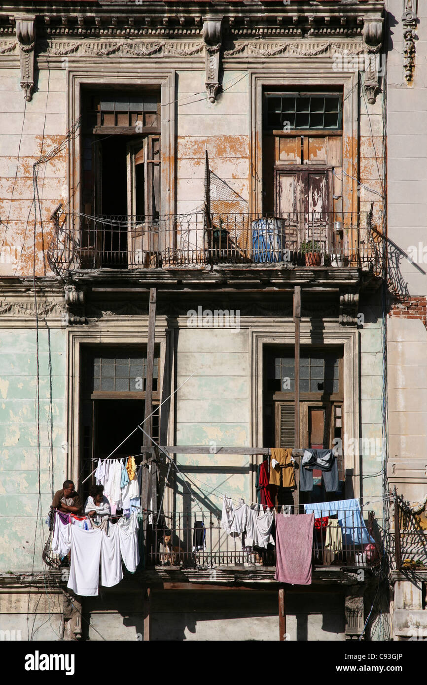Cuban family at the balcony in the historical centre of Havana, Cuba ...