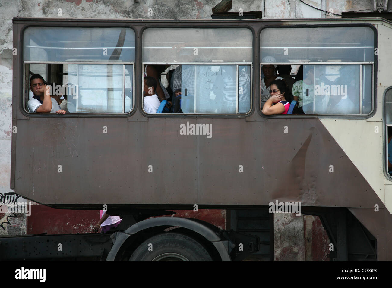 Passengers inside the camello trailer bus in Havana, Cuba Stock Photo ...