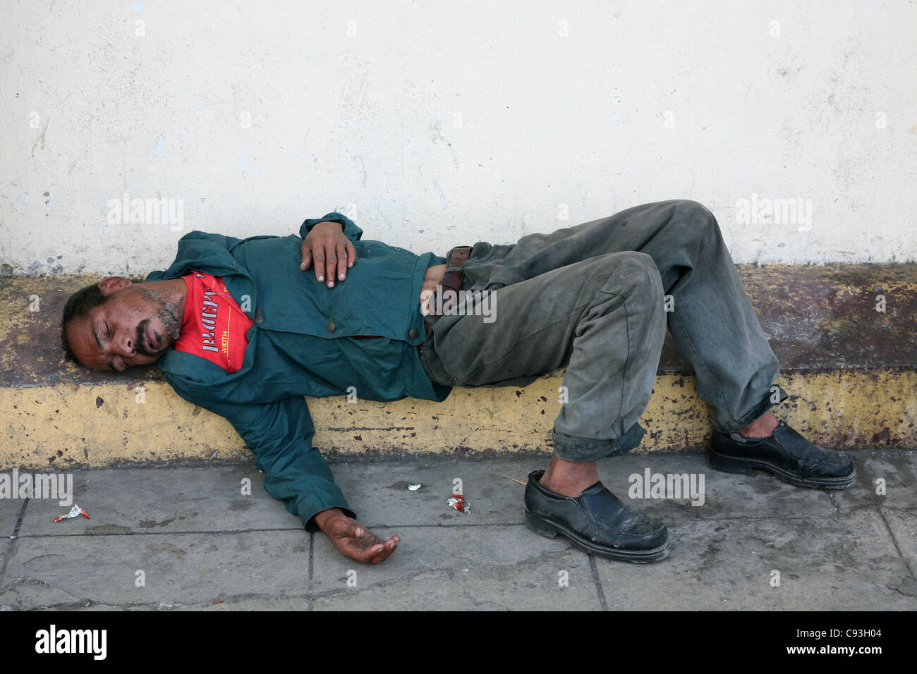 Elderly Cuban man sleeping in the street in the historical centre of ...