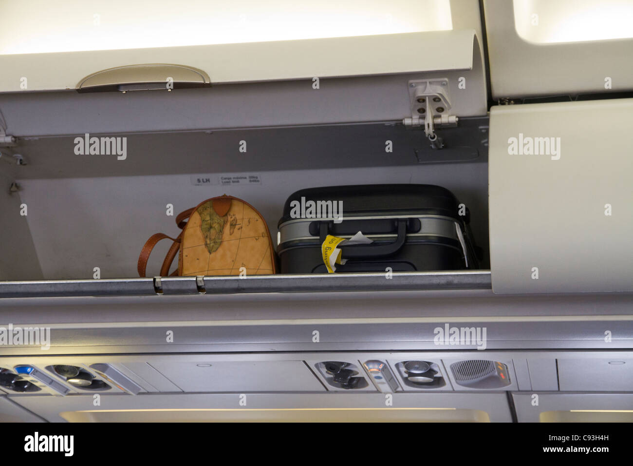 Baggages on board of airbus airplane low cost airline Europe Stock ...