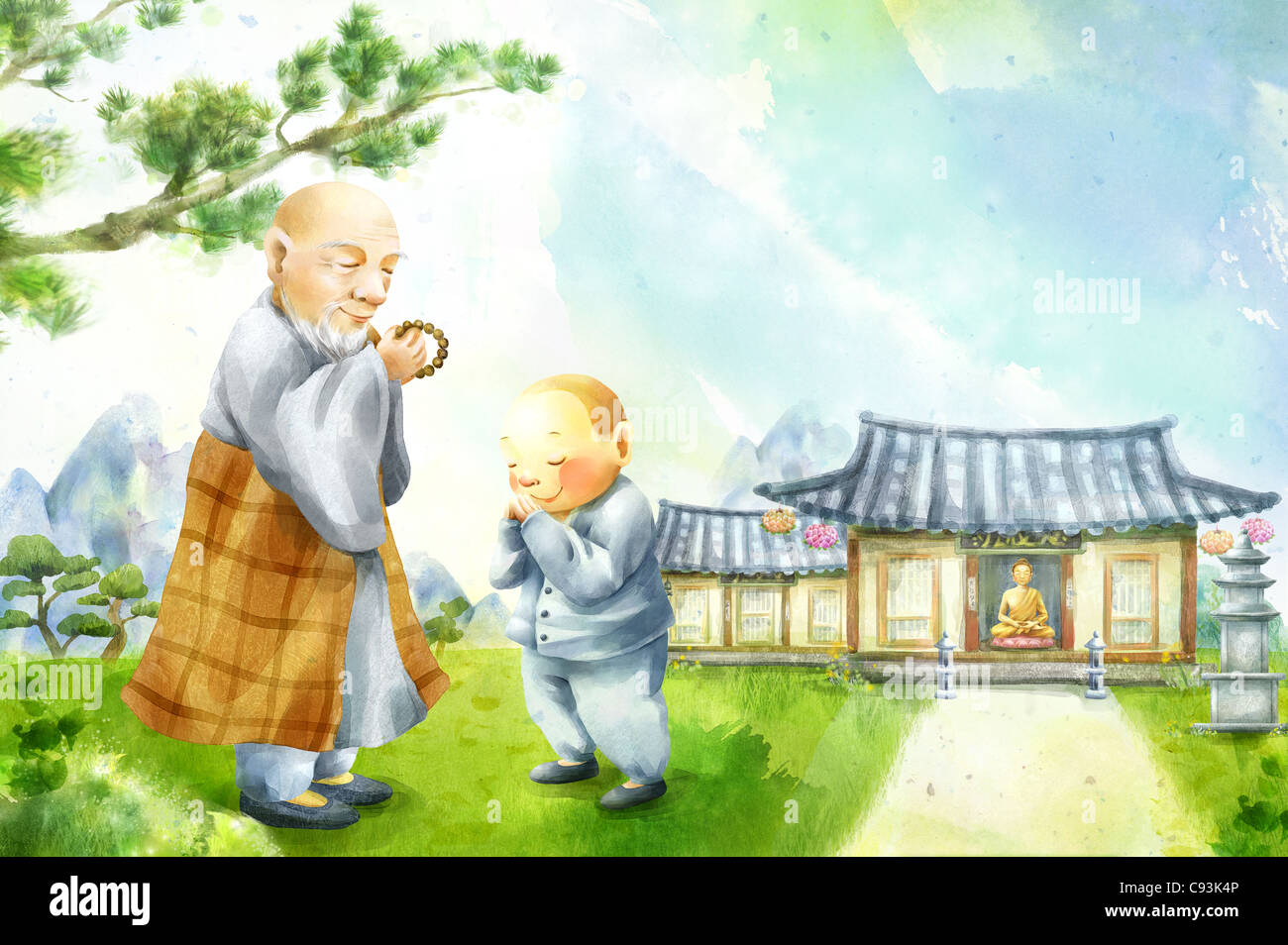 A little Buddhist monk (8-9) in praying position in front of old monk ...