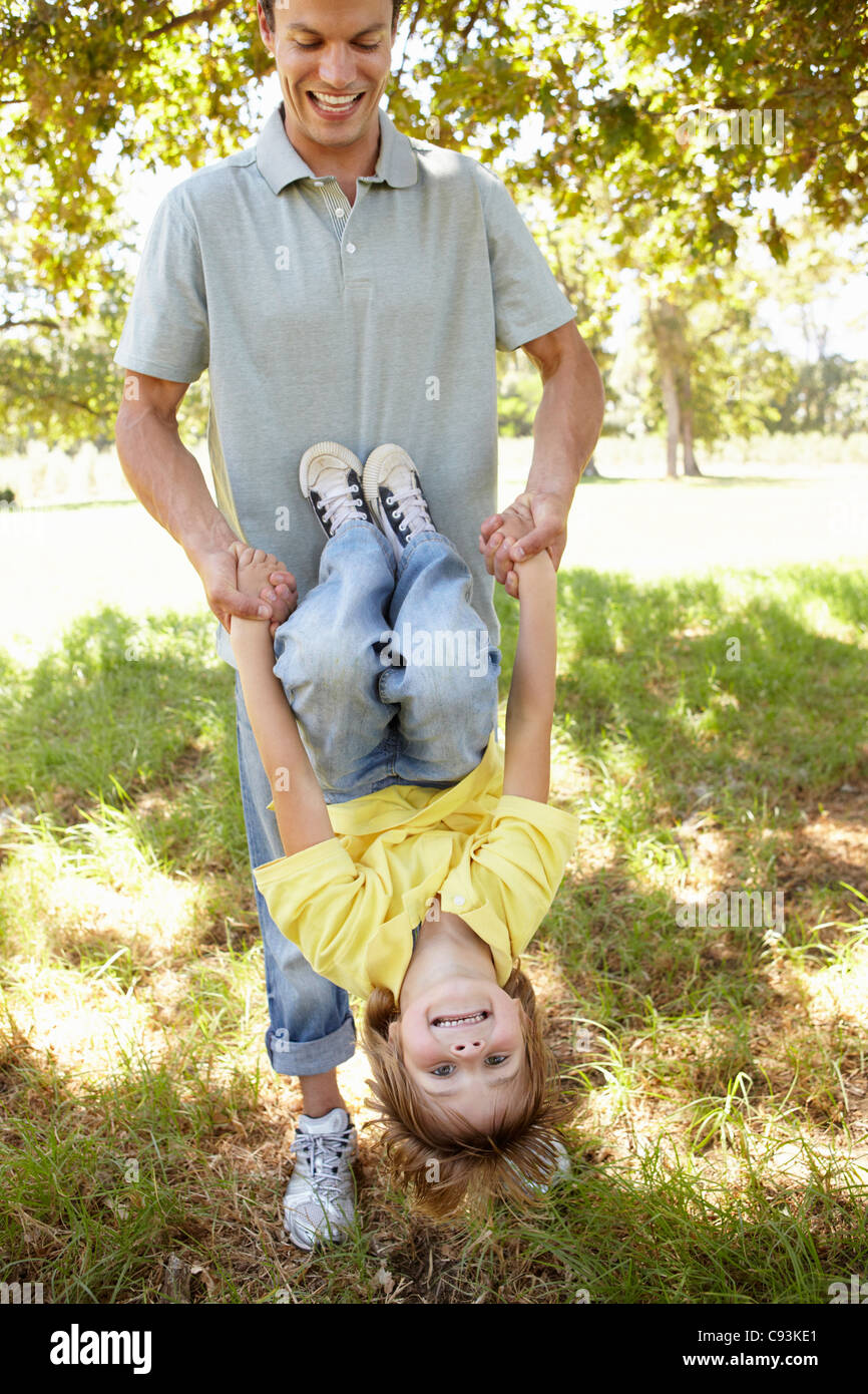 Father and son playing outdoors Stock Photo - Alamy Father and son playing outdoors Stock Photo - Alamy
