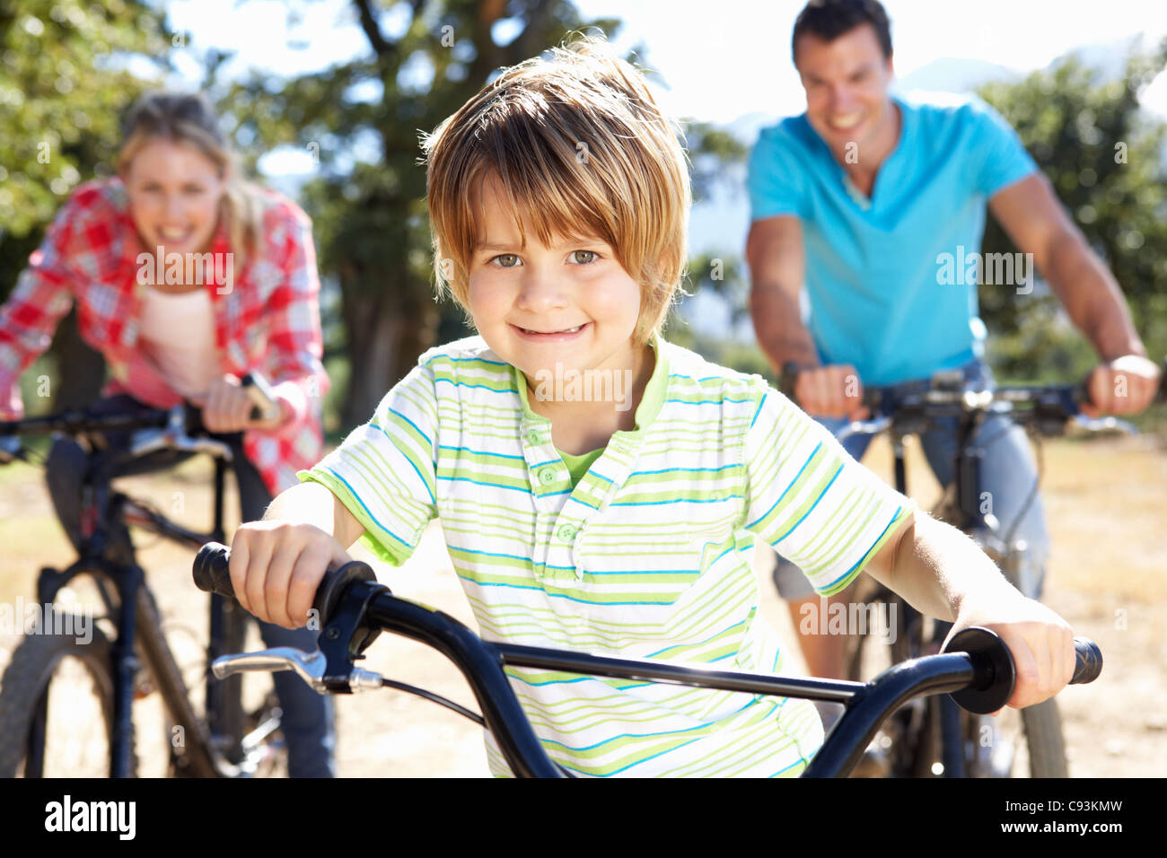 Young woman child bike country hi-res stock photography and images - Alamy