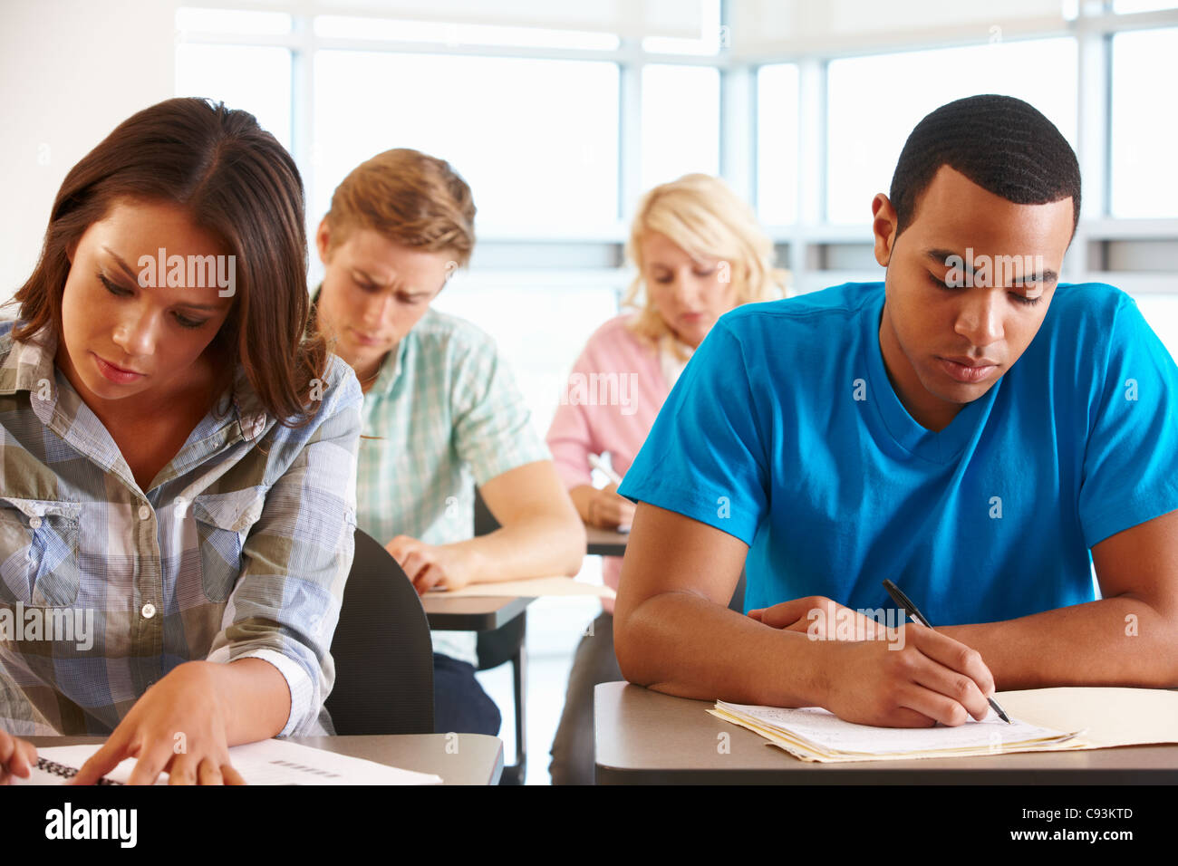 Group teens work together classroom hi-res stock photography and images ...