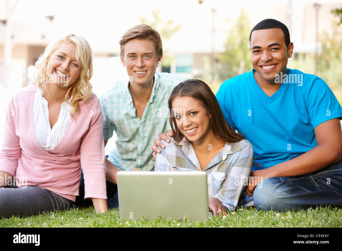 Young people using laptop outdoors Stock Photo - Alamy Young people using laptop outdoors Stock Photo - Alamy