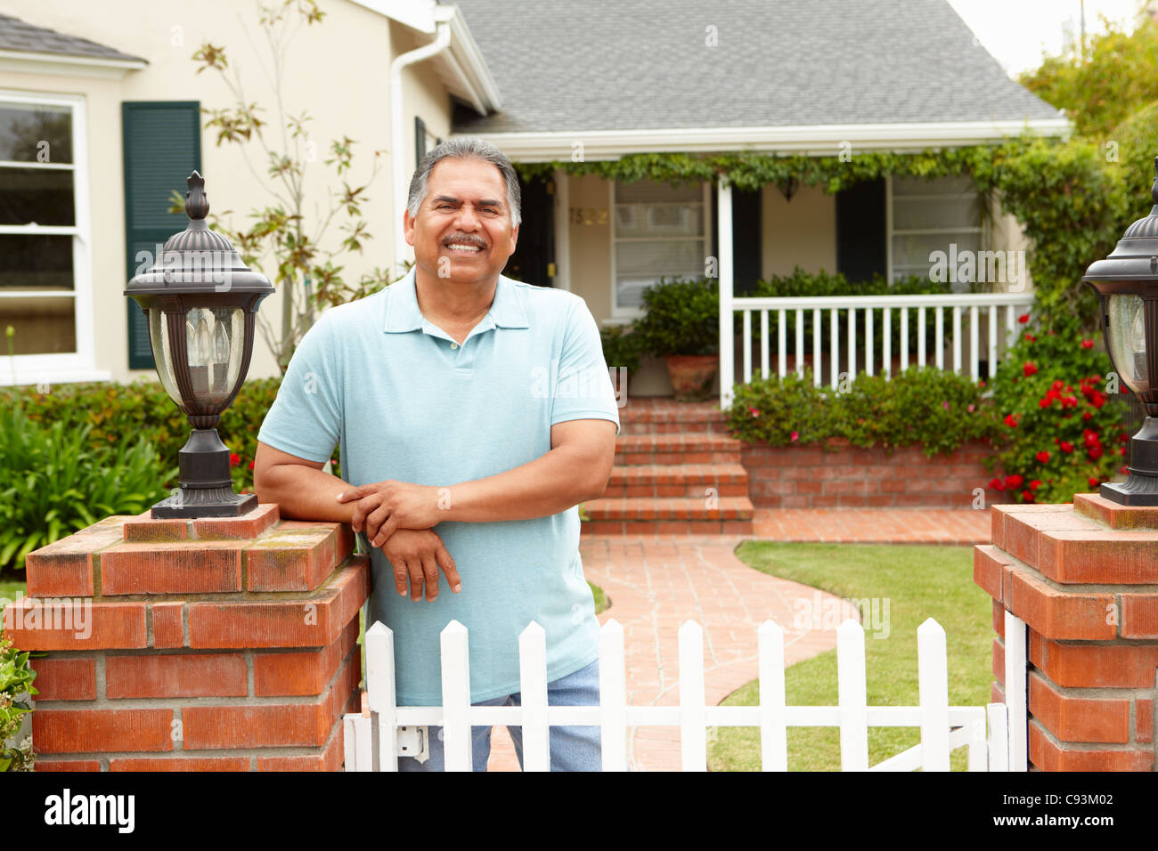 Senior Hispanic man outside home Stock Photo - Alamy