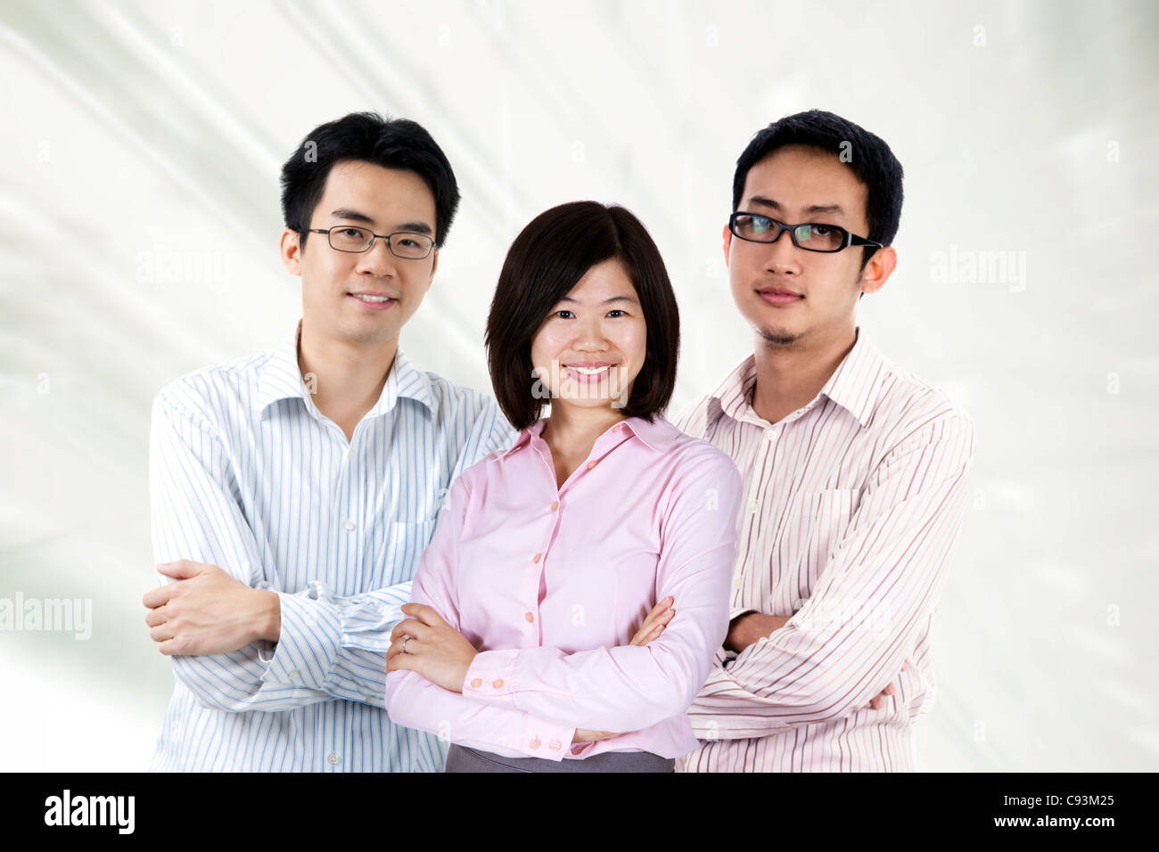 Asian business team on office background Stock Photo - Alamy