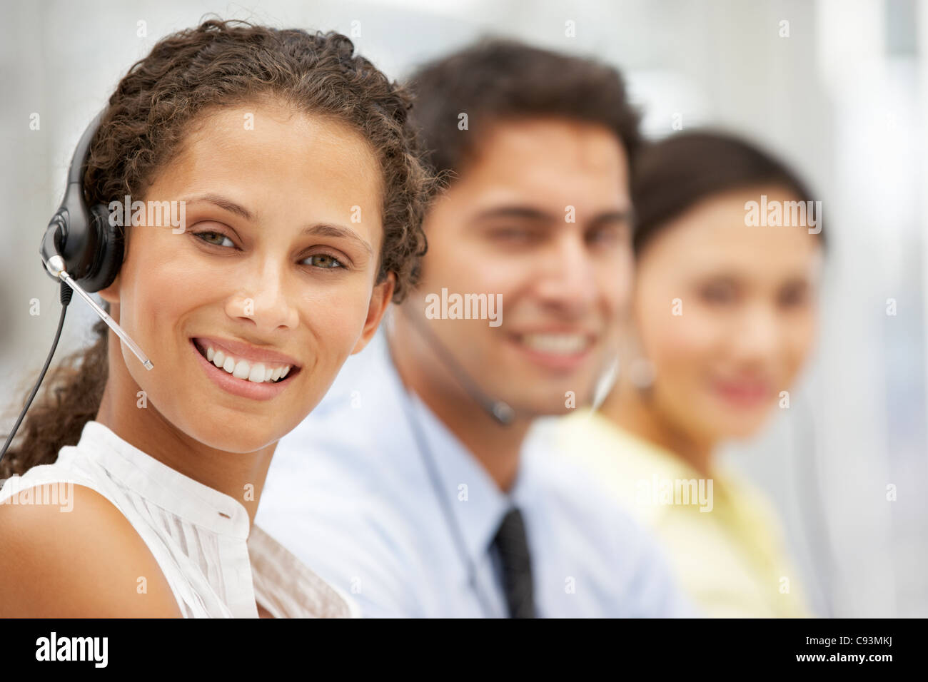 Businesswoman wearing headset working in hi-res stock photography and ...