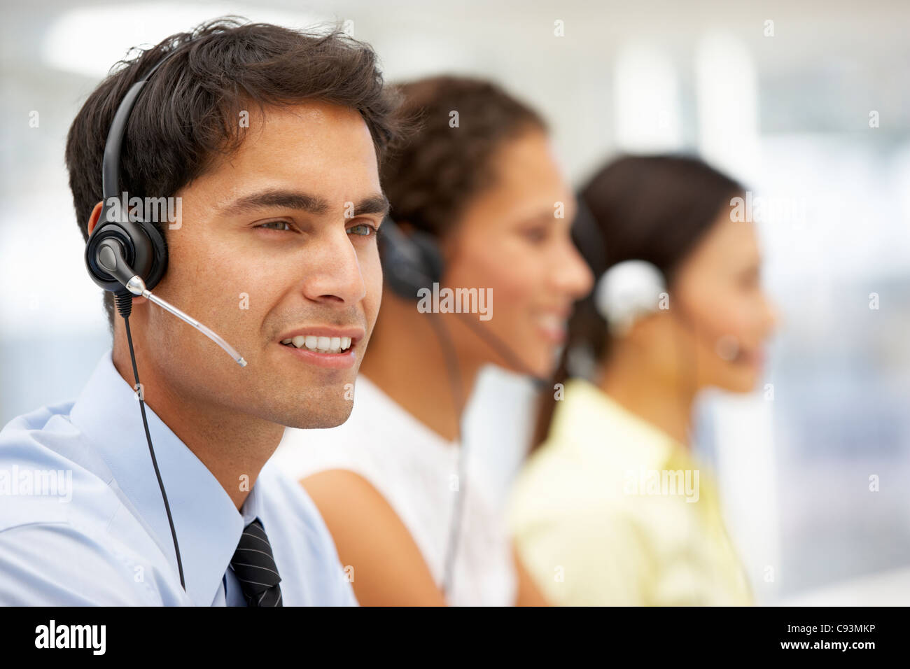 Businessman wearing headset Stock Photo - Alamy