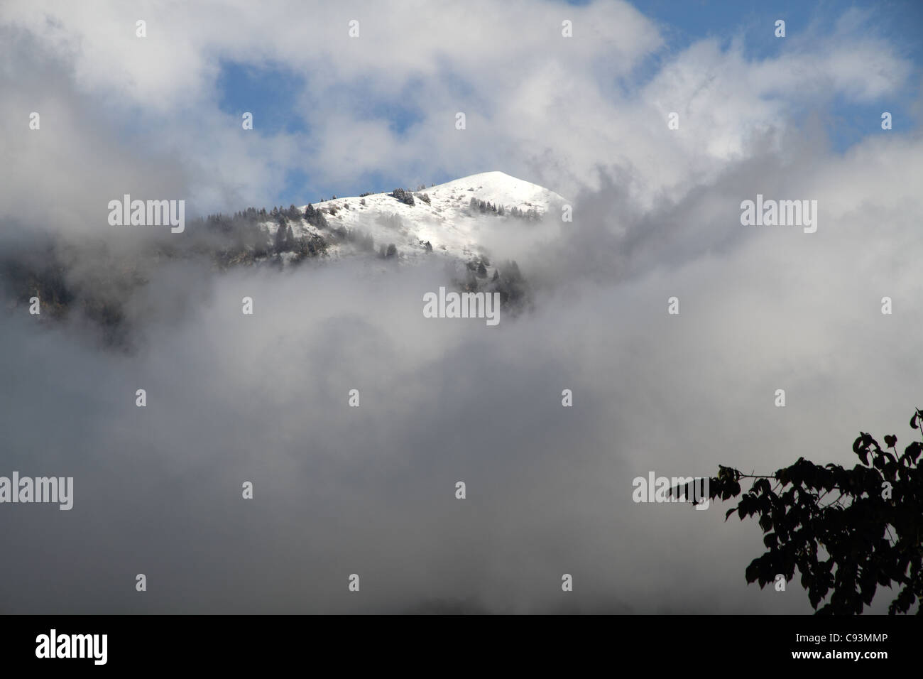 Snow capped mountains surrounding the French village of Sameon Stock ...