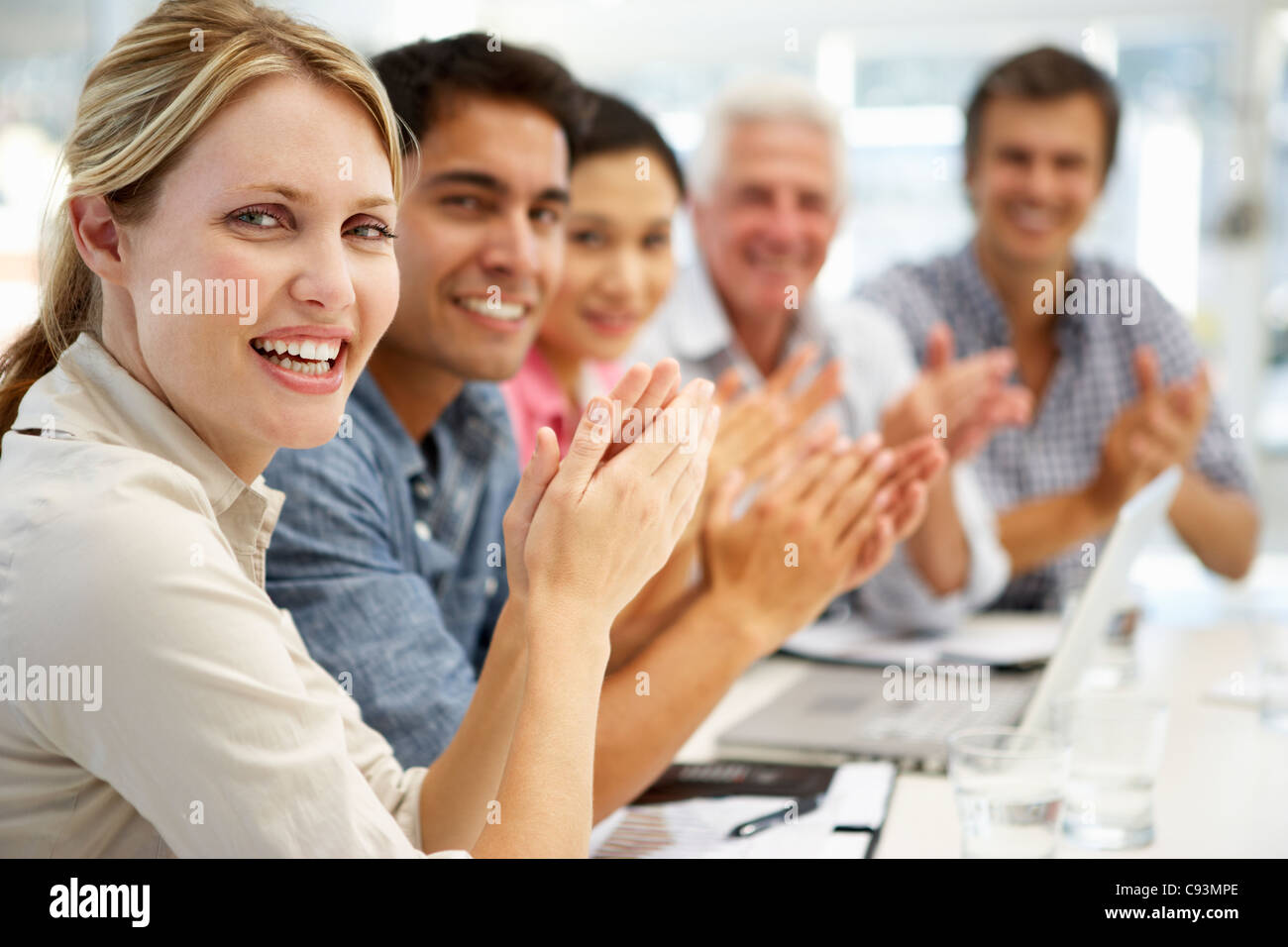 Mixed group in business meeting Stock Photo - Alamy