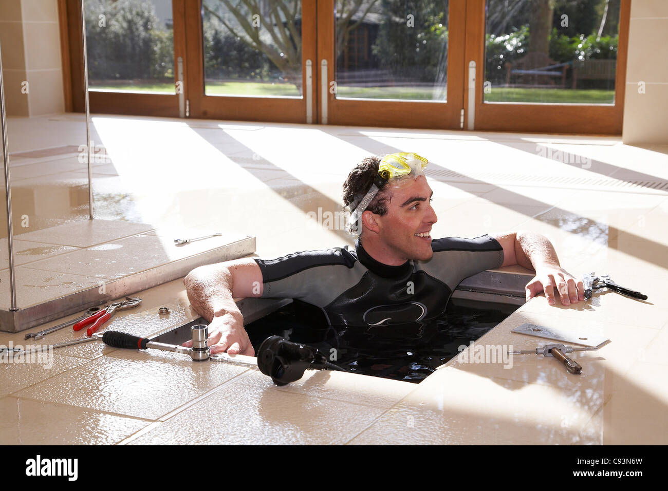 Man entering a pool hi-res stock photography and images - Alamy