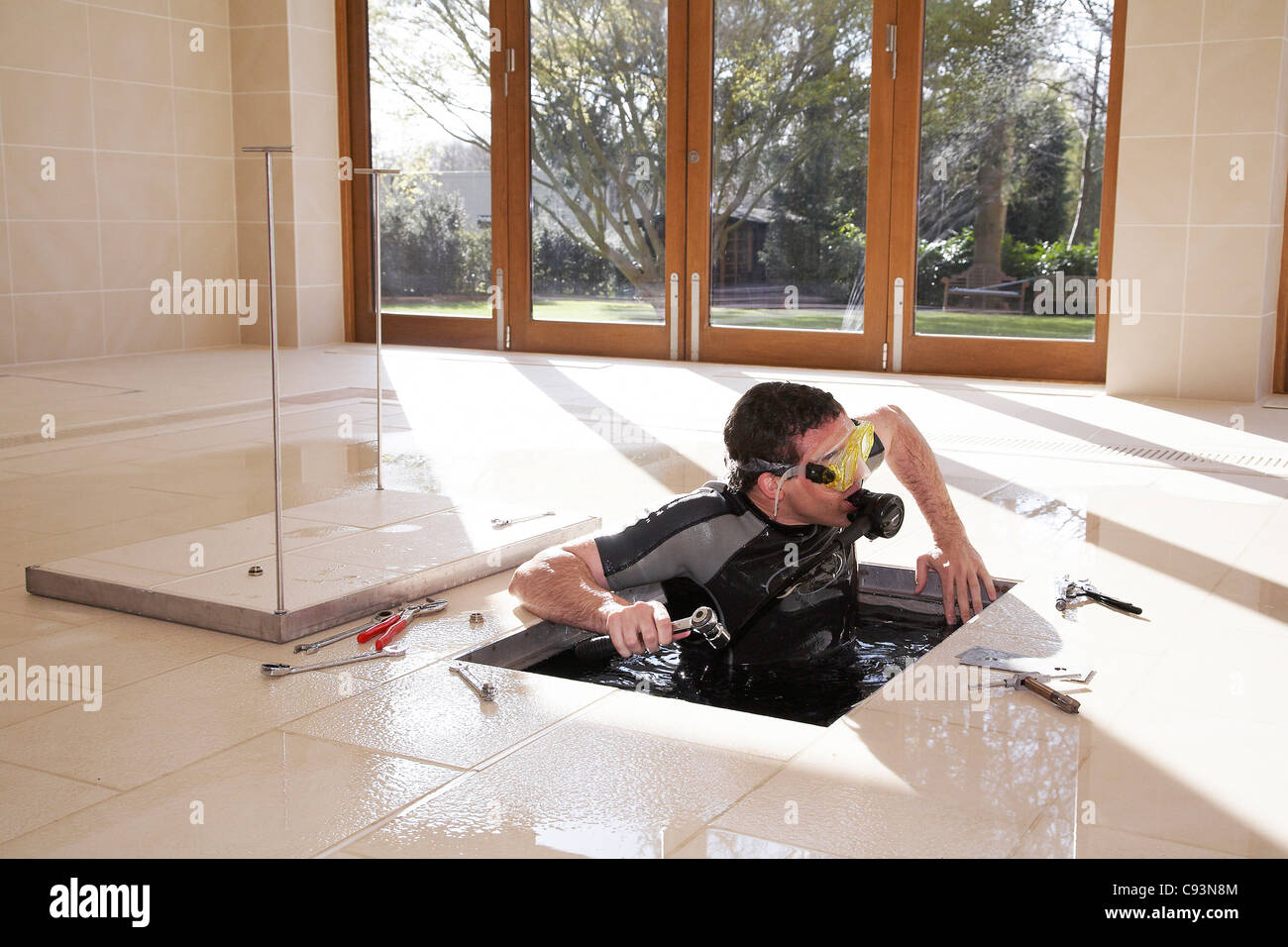 Man entering a pool hi-res stock photography and images - Alamy