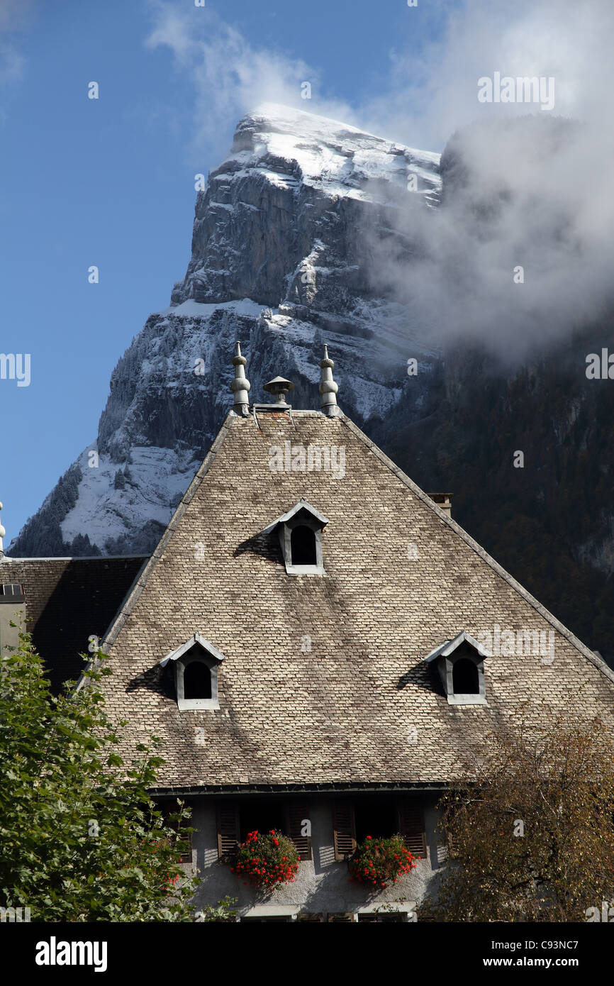 Snow capped mountains surrounding the French village of Sameon Stock ...
