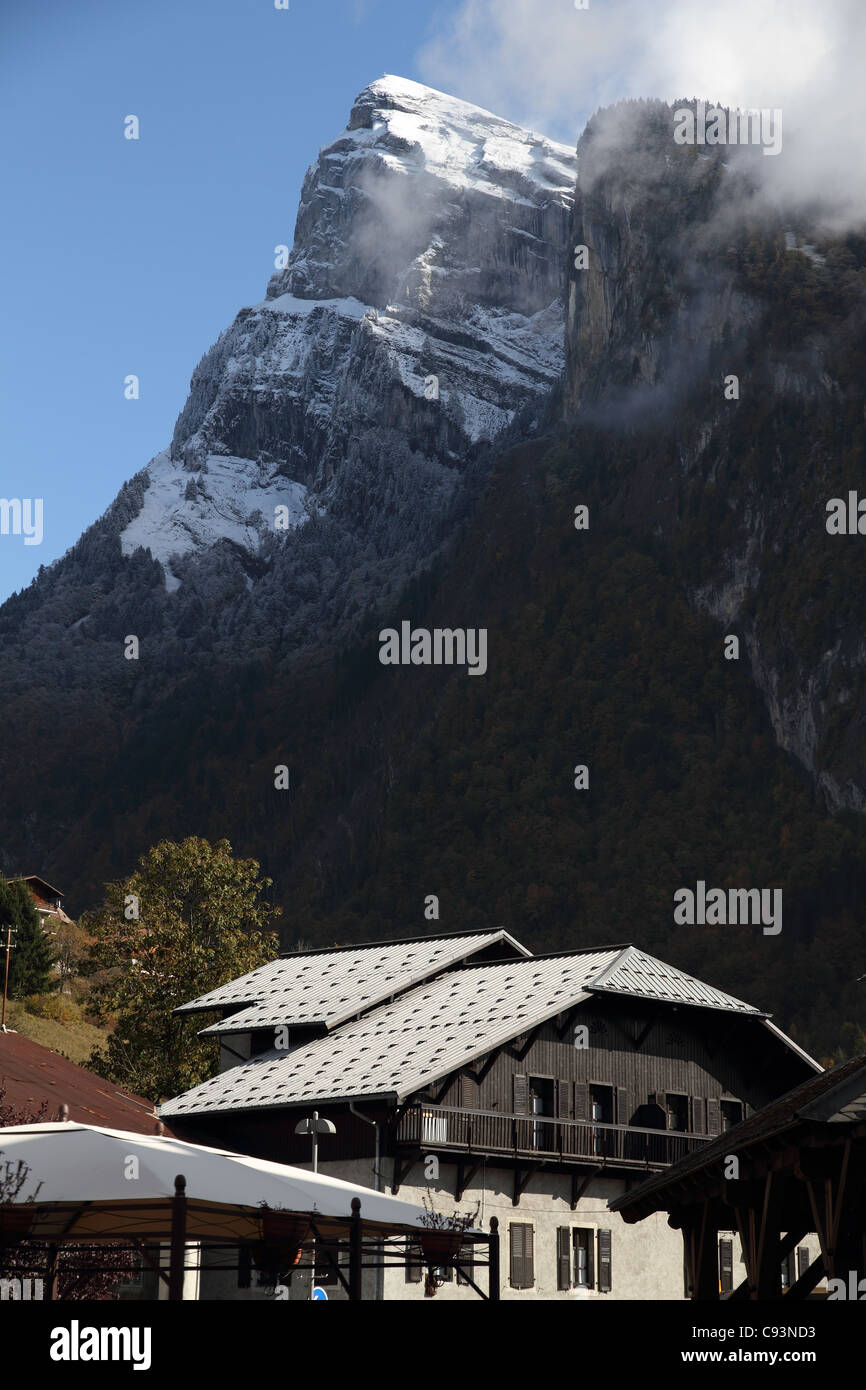 Snow capped mountains surrounding the French village of Sameon Stock ...