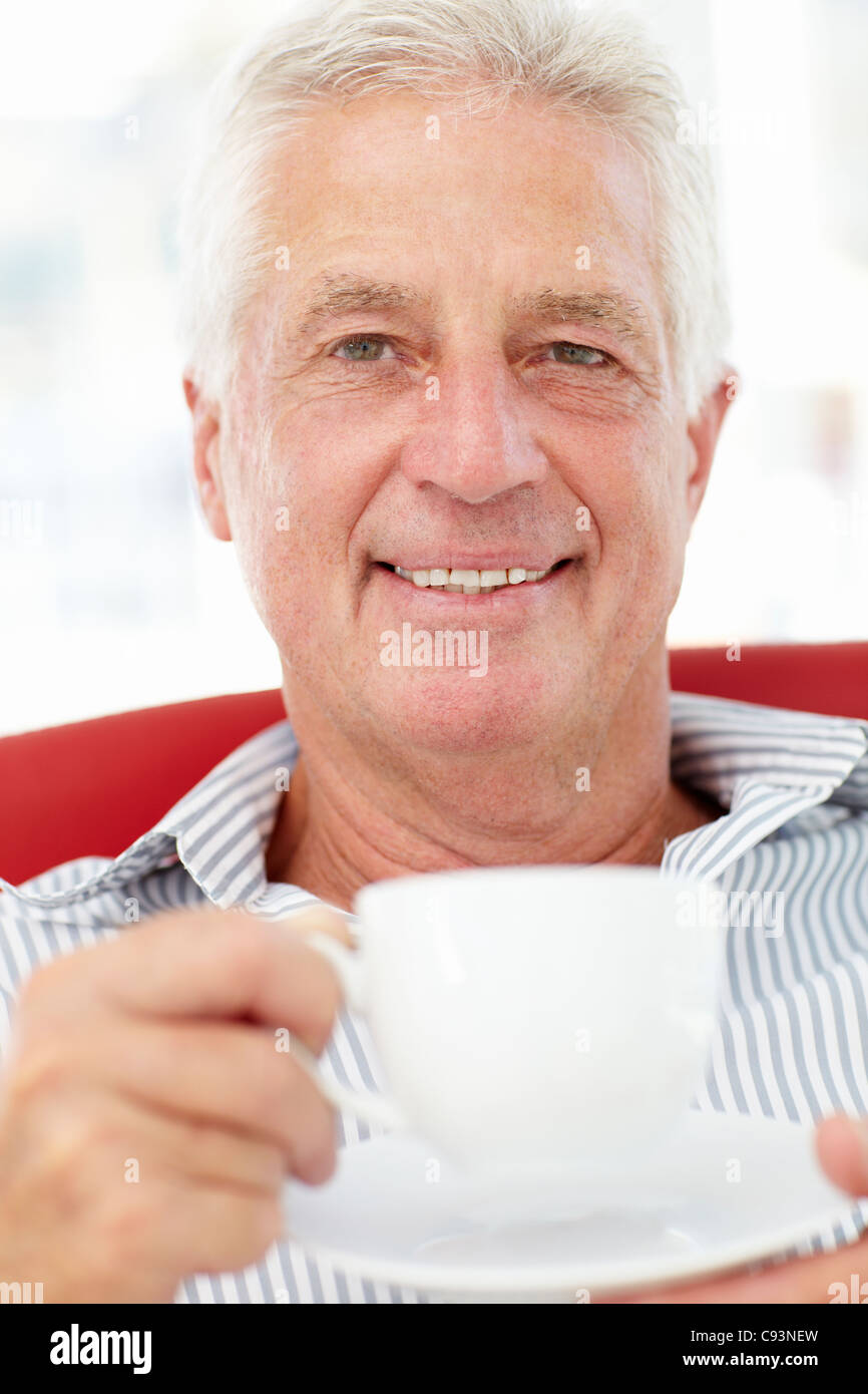 Older man with cup hi-res stock photography and images - Alamy