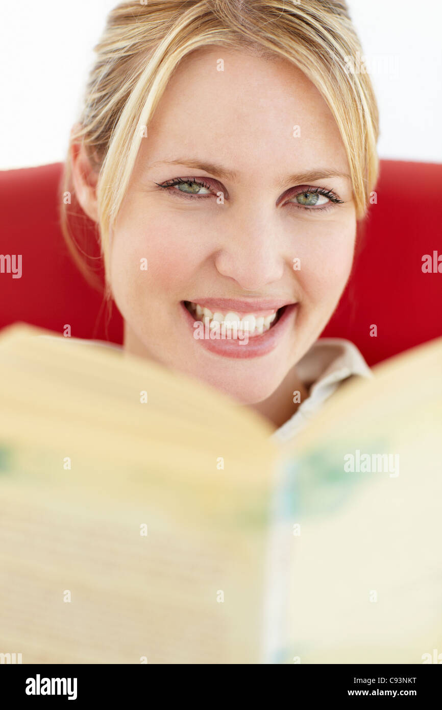 Woman reading book Stock Photo - Alamy