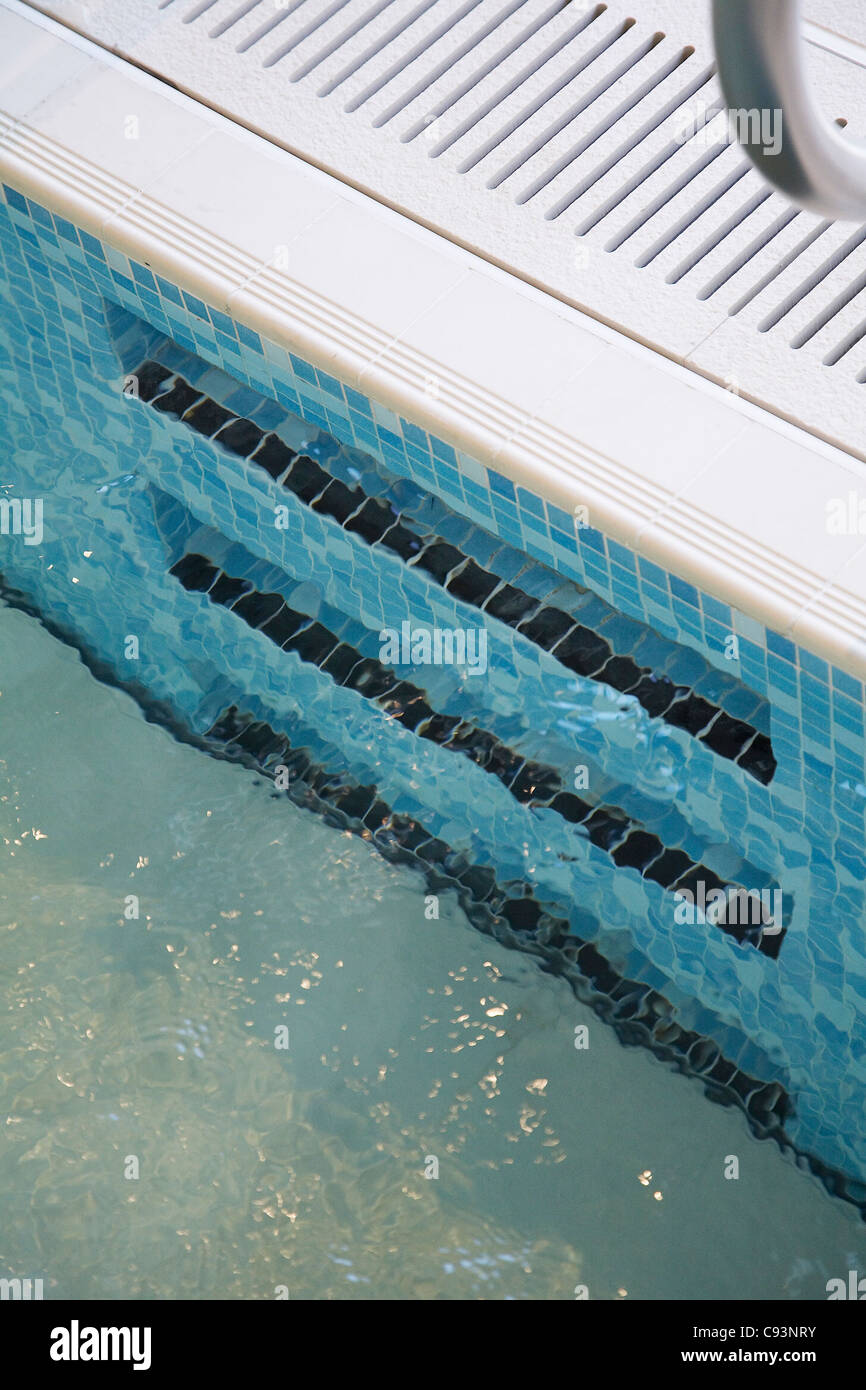 Swimming pool steps Stock Photo - Alamy