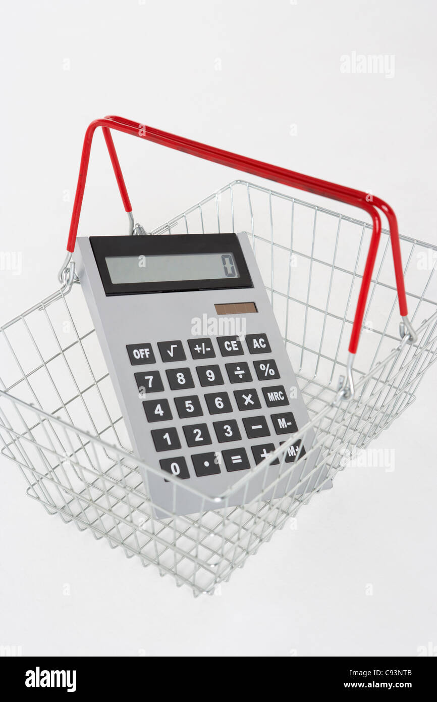 supermarket basket and calculator Stock Photo - Alamy