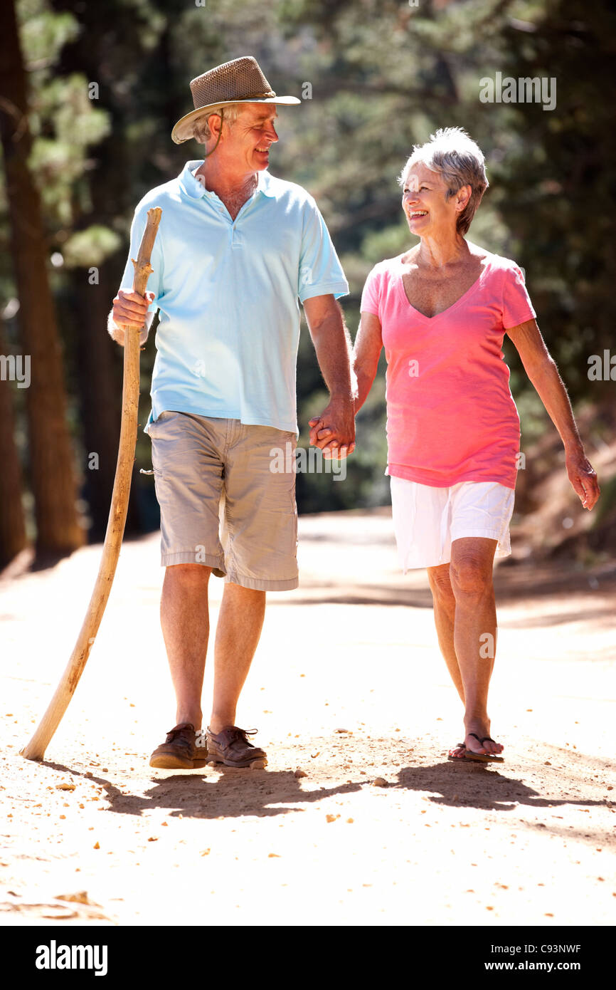 Senior couple on country walk Stock Photo - Alamy