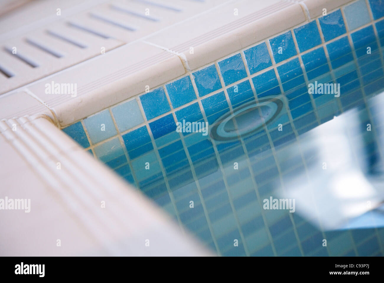 Close up of blue mosaic tiles at the side of a swimming pool Stock ...