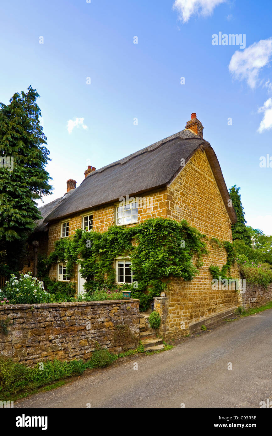 A thatched property named Arnold's cottage Wroxton Oxfordshire UK Stock ...