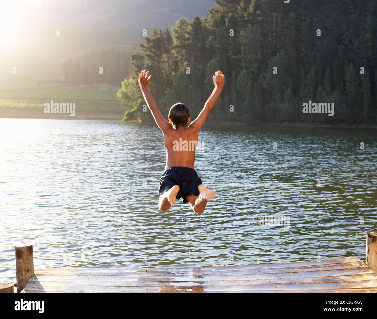 Boy diving into river hi-res stock photography and images - Alamy