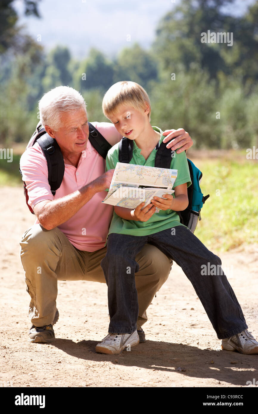 Senior manwith grandson on country walk Stock Photo - Alamy