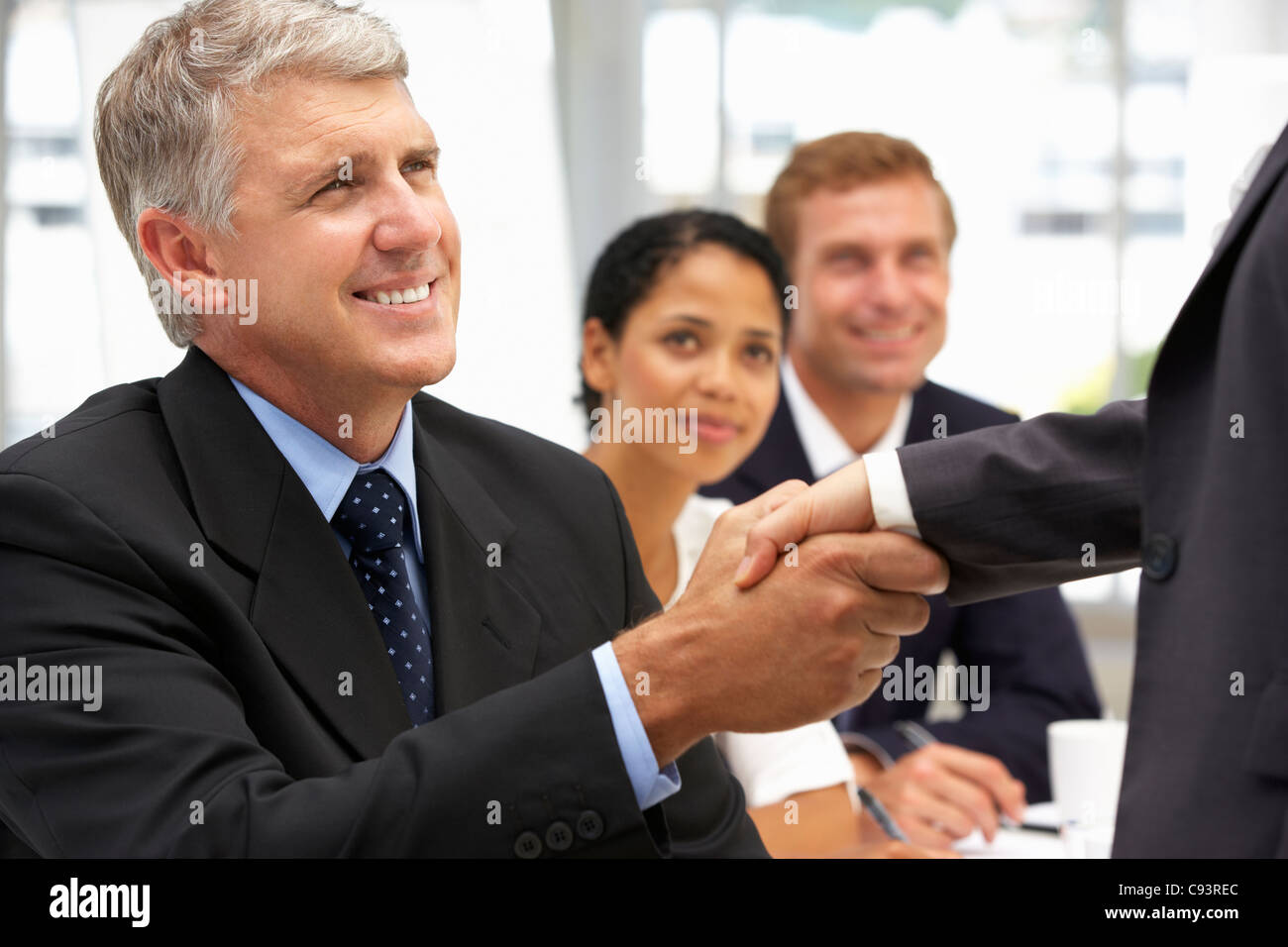 Business people handshake Stock Photo - Alamy