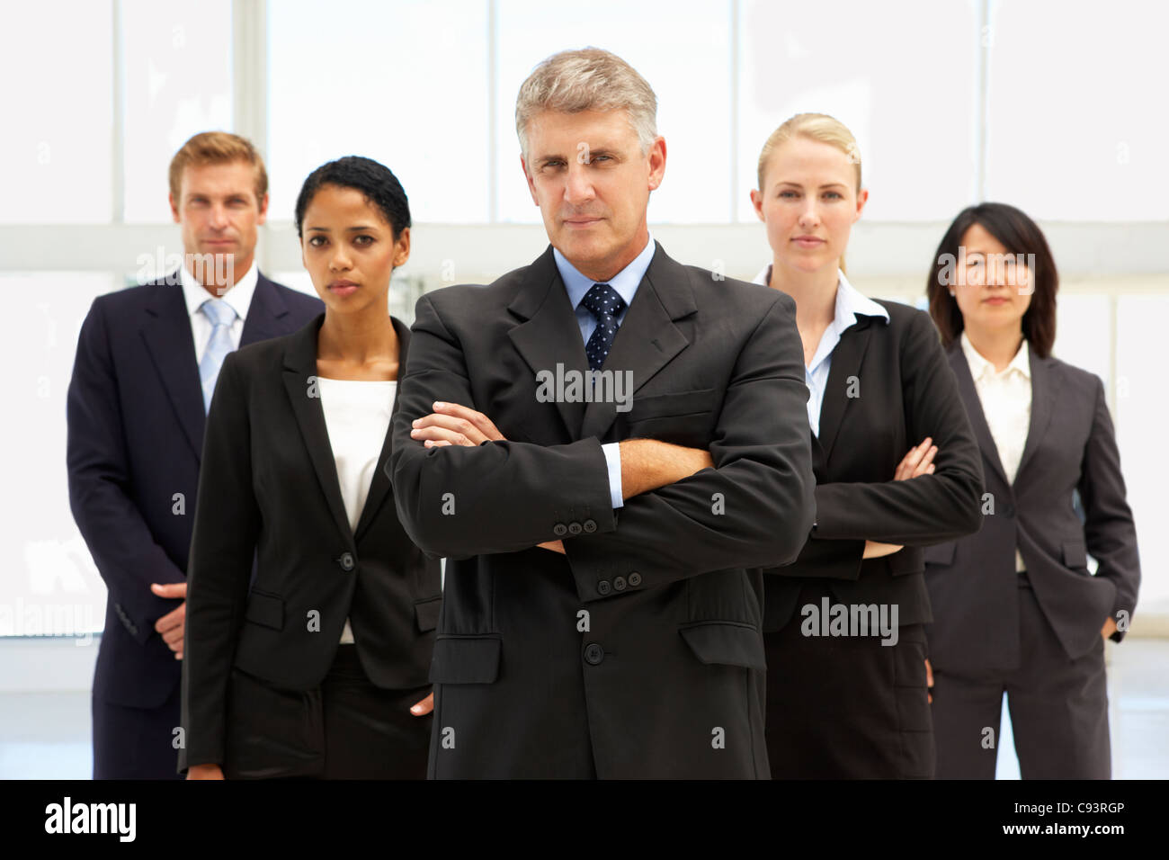 Wearing business suits hi-res stock photography and images - Alamy