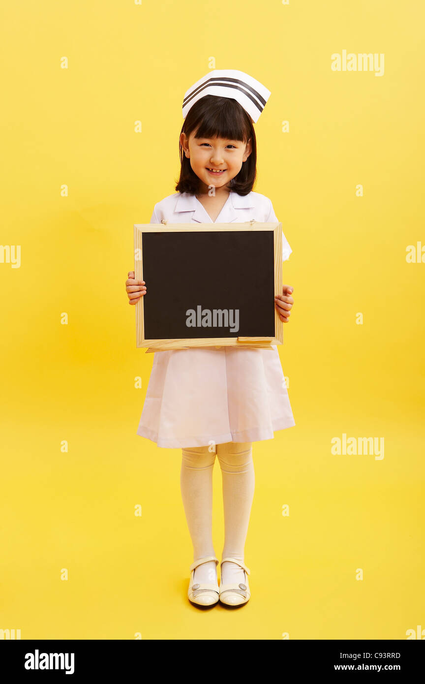 Child holding slate hi-res stock photography and images - Alamy