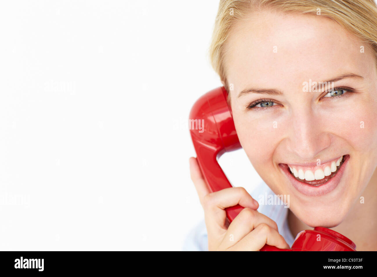 Woman talking on telephone Stock Photo - Alamy